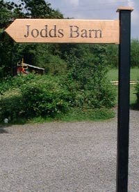 Wooden Posts, Oak Posts, Wrought Iron Bracket | The Sign Maker