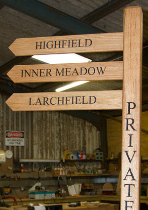 Wooden Posts, Oak Posts, Wrought Iron Bracket | The Sign Maker